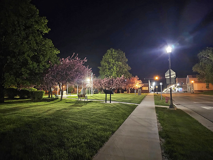 Evening strolls in Harmony feel impossibly safe under vintage lampposts that cast pools of golden light.