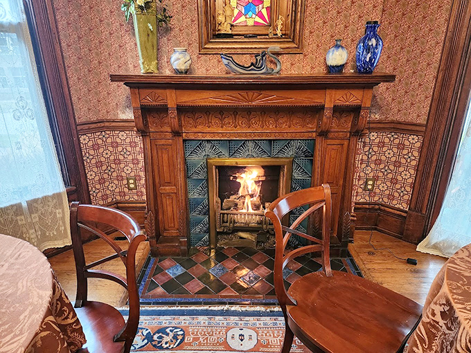 Ornate Fireplace Close-Up: Intricate woodwork frames dancing flames, creating a focal point that has warmed both bodies and souls for over a century.