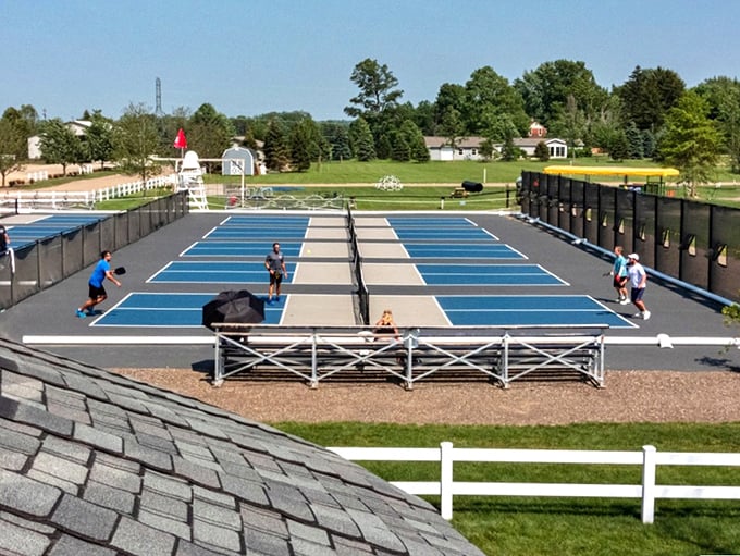 Pristine pickleball courts await competitive spirits, where the satisfying pop of ball meeting paddle soundtracks friendly tournaments under open skies.