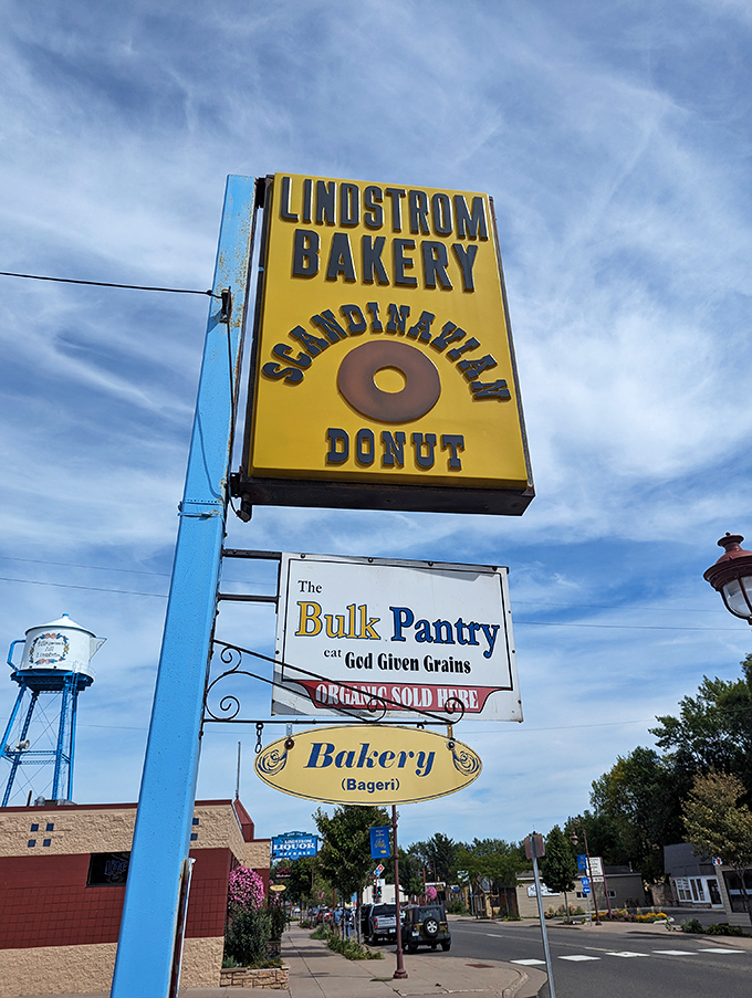 The bright yellow sign stands as a beacon of sweetness against the Minnesota sky, promising authentic Scandinavian treats within.