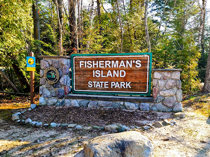 The gateway to tranquility &ndash; Fisherman's Island State Park's entrance sign promises adventure while the stone pillars stand guard like friendly sentinels.