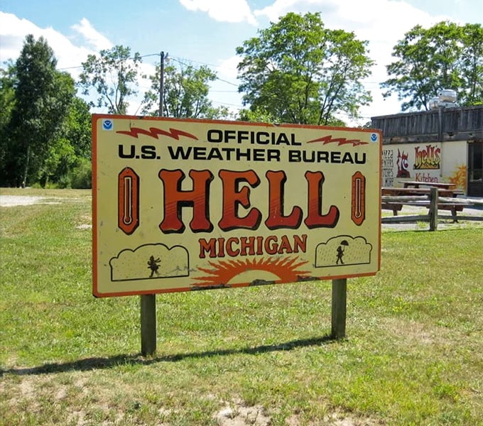 The official welcome sign greets visitors with sunny optimism, establishing Hell as Michigan's most hysterically named historical destination since 1841.
