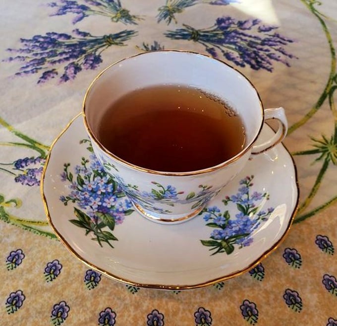 Delicate china adorned with lavender serves as the perfect vessel for properly brewed tea, encouraging moments of quiet appreciation between bites.