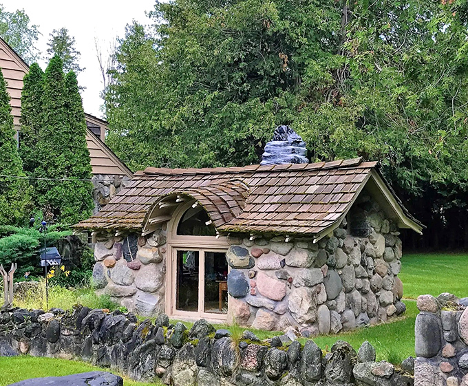 Aptly nicknamed "The Dollhouse," this diminutive stone cottage proves that architectural magic comes in all sizes.