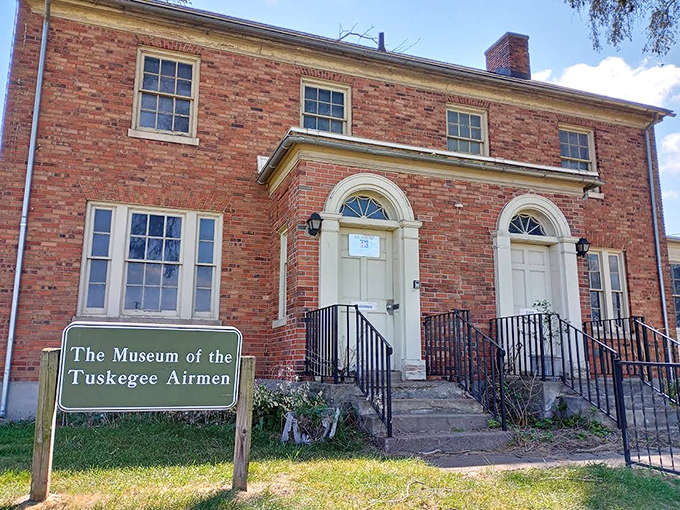 The Museum of the Tuskegee Airmen honors the legendary pilots who broke barriers while breaking the sound barrier, housed fittingly in this historic brick building.
