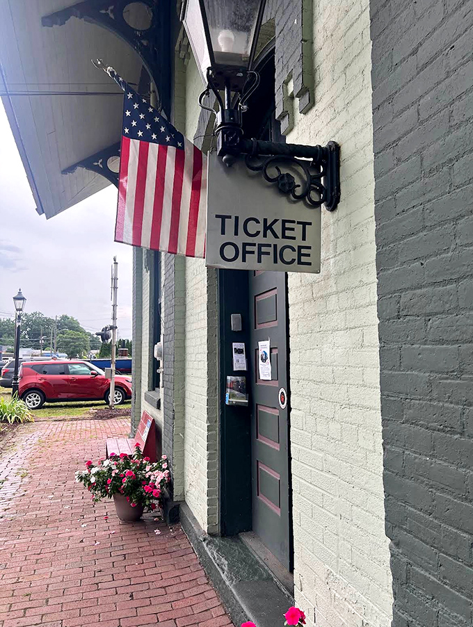 The ticket office beckons with nostalgic charm, where purchasing your passage feels like the first step in a grand adventure.