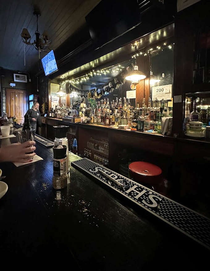 Bar: The well-worn bar counter has supported the elbows of countless Detroiters sharing stories, sorrows, and celebrations since 1876.