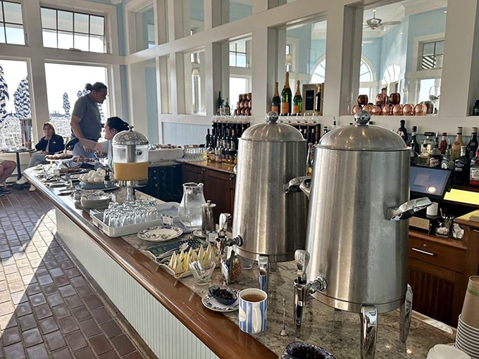 Morning fuel station where silver urns of steaming coffee promise to transform night owls into early birds.