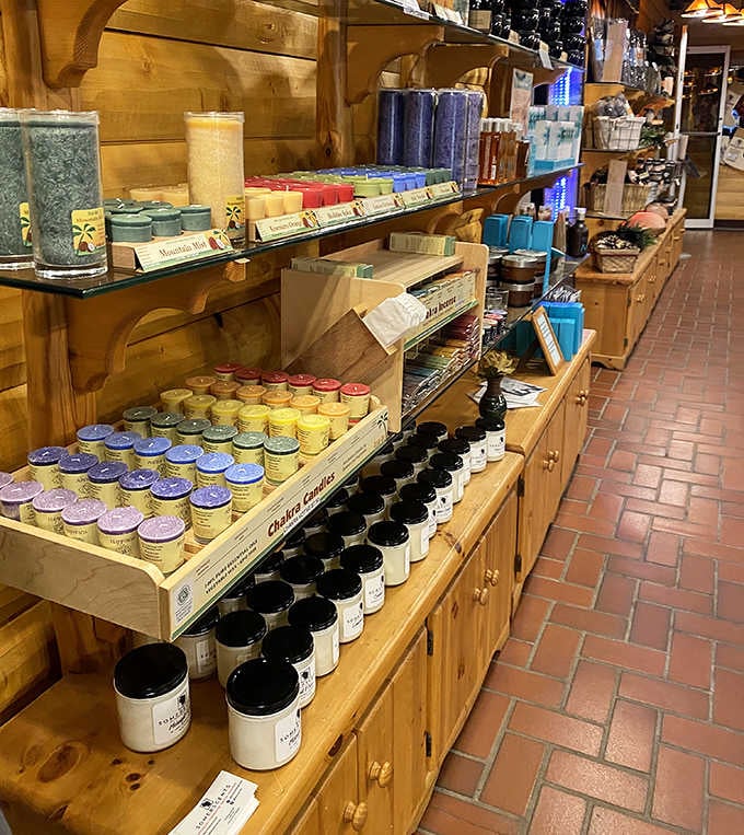 A rainbow of healing candles awaits. Each color promising different benefits, all delivering the same message: slow down.