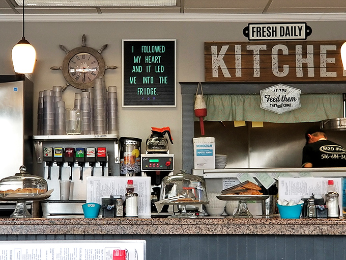 At the counter, coffee flows freely and locals exchange news while waiting for their comfort food fix.