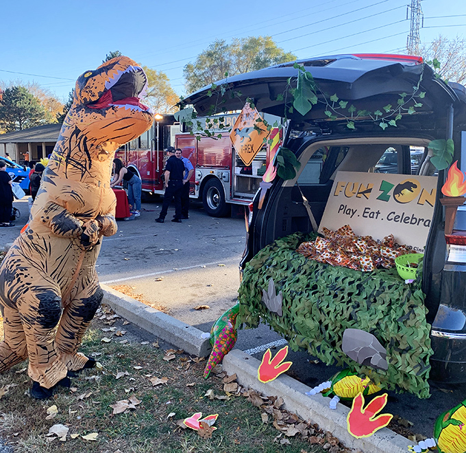 Trick-or-treating gets a Jurassic twist! This dinosaur-themed display shows how Fun ZoneZ transforms seasonal celebrations into prehistoric adventures.