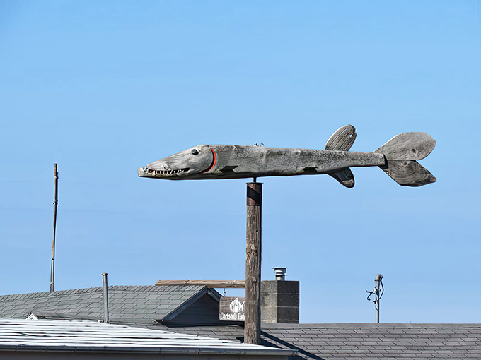 Even the weathervane is committed to the fishing theme, because when you're this authentic, you go all in on the maritime aesthetic.