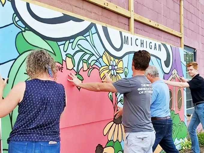 Community creativity in action &ndash; local artists transform blank walls into vibrant murals that tell stories of connection and imagination.