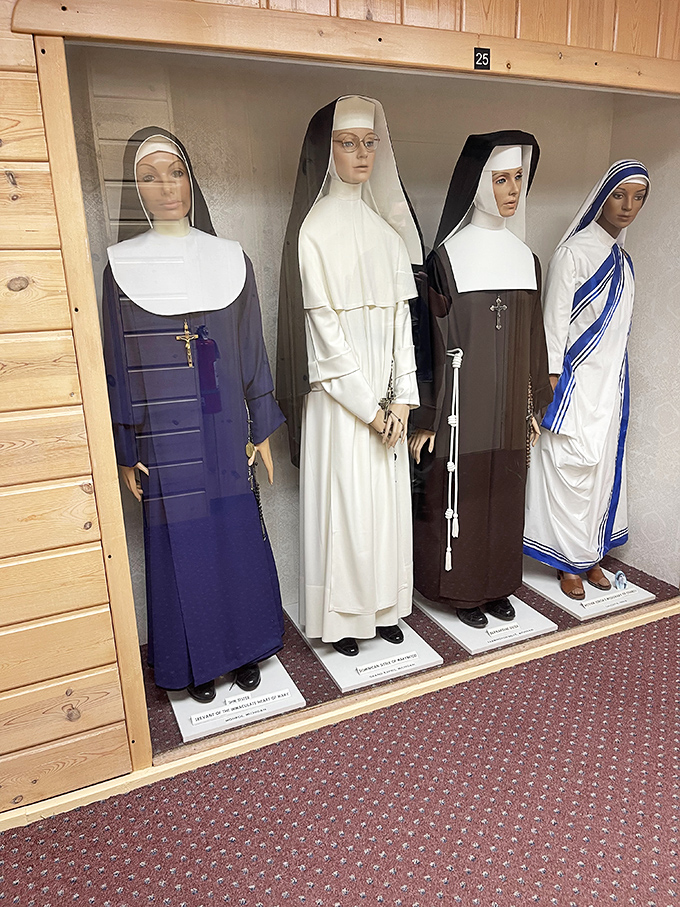 Life-sized figures representing various religious orders stand in silent testimony, their detailed habits showcasing the diversity within religious vocations.