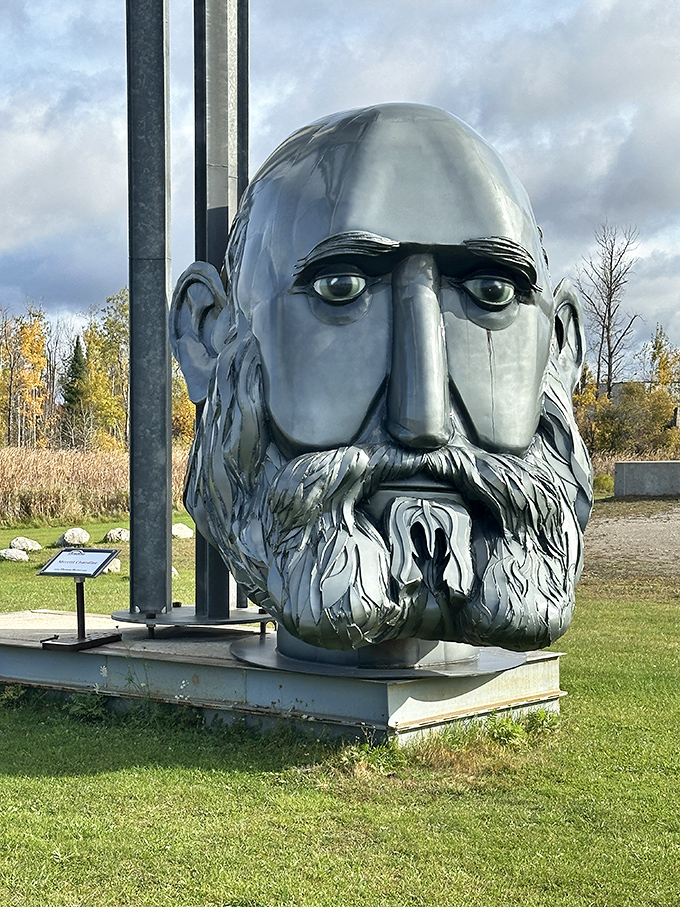 This silver-bearded sage watches over the park with metallic wisdom, looking like he might start dispensing philosophical advice if you stare long enough.