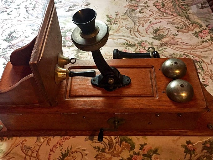 An antique telephone sits ready for calls that will never come &ndash; a charming reminder of communication before the digital age.