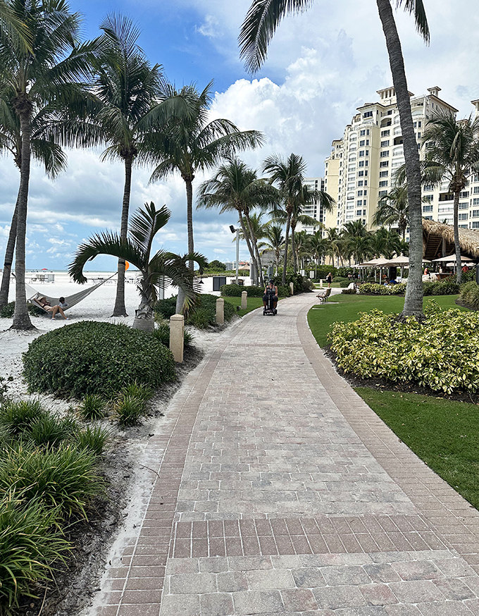 This manicured pathway leads beachgoers from luxury to natural splendor, the best of both worlds just steps apart.