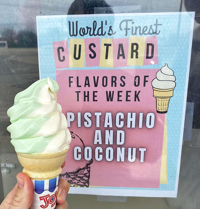 Pistachio and coconut custard &ndash; a pale green dream swirled into a perfect peak, like a tropical vacation that fits in one hand.
