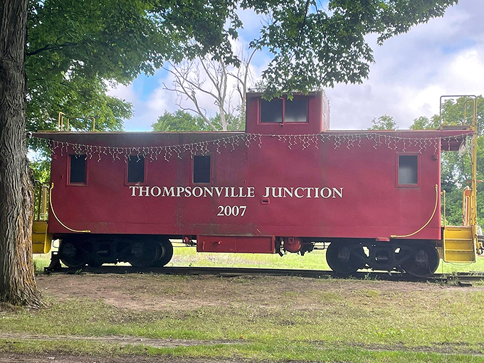 This red caboose at Thompsonville Junction stands as a colorful reminder that you're traveling a path where trains once thundered.
