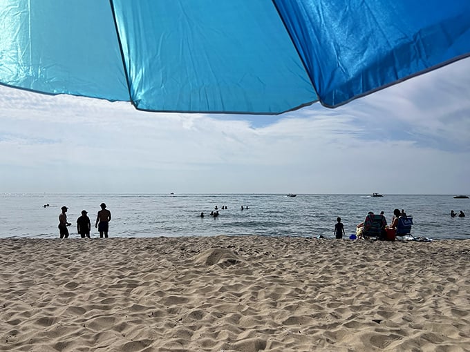 Beach day essentials: sunshine, sand, water, and the simple joy of disconnecting from screens to reconnect with nature.