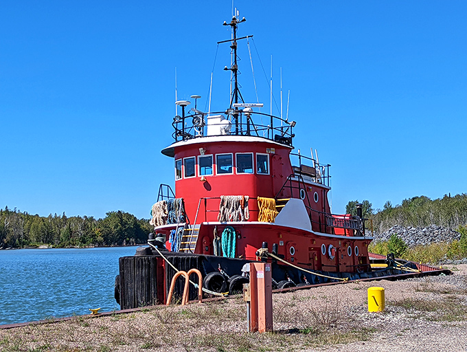 Maritime history at rest: This vintage tugboat stands as a colorful reminder of Lake Superior's working past amid its recreational present.