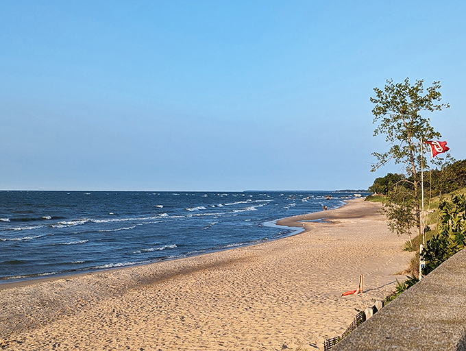 Lake Huron shows its playful side as gentle waves create a rhythmic soundtrack for beachcombers and sun-seekers alike.