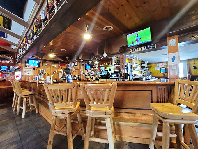 The rustic wooden bar invites patrons to pull up a stool, where bartenders often reach for regulars' drinks before they're ordered.