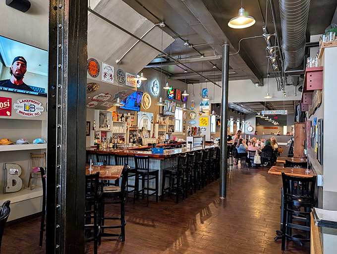 The bar area invites lingering conversations and local beer sampling &ndash; the perfect complement to a barbecue feast.