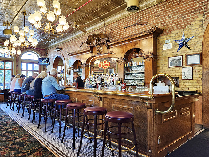 The bar area, with its polished wood and vintage fixtures, looks like it was plucked straight from a movie about the good old days.