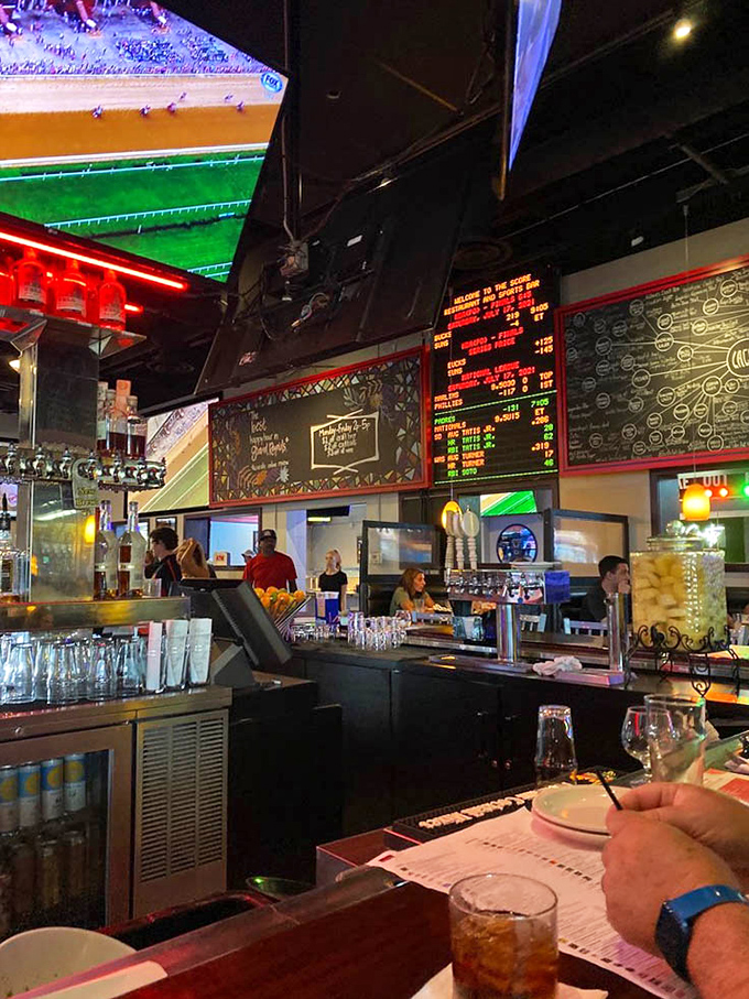 Behind the bar, an impressive lineup of spirits stands ready for transformation into tropical concoctions that taste like vacation in a glass.