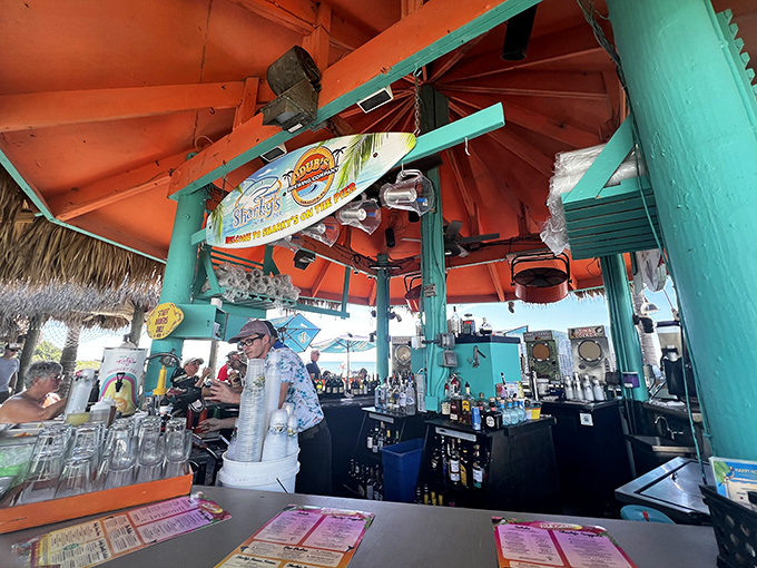Aloha, happy hour! Grab a frozen cocktail and watch the waves crash from this colorful, thatched-roof tropical bar.