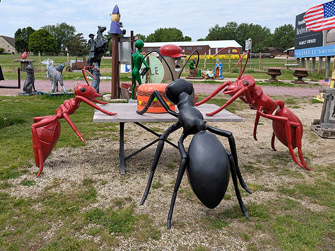These supersized ants would send any picnicker running for the hills, but they're perfectly content with their sculptural hamburger feast.