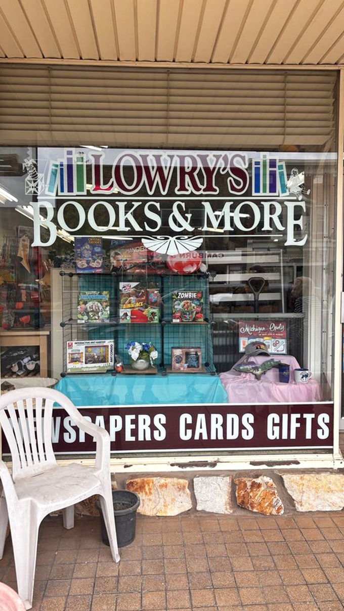 The stained glass-inspired logo welcomes visitors with a promise of "Books & More," an understatement of epic proportions.