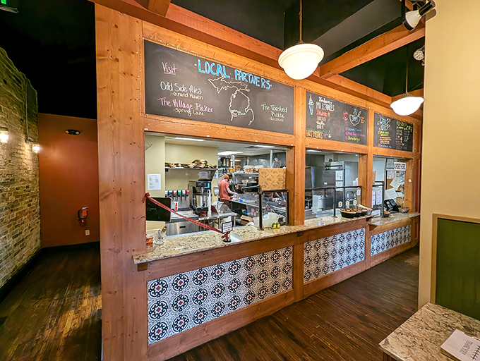 Counter seating offers a front-row view of sandwich artistry, where every order comes together right before your eyes.