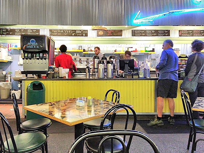 Counter: The beating heart of the operation, where baristas craft coffee magic and regulars exchange friendly banter with the staff.