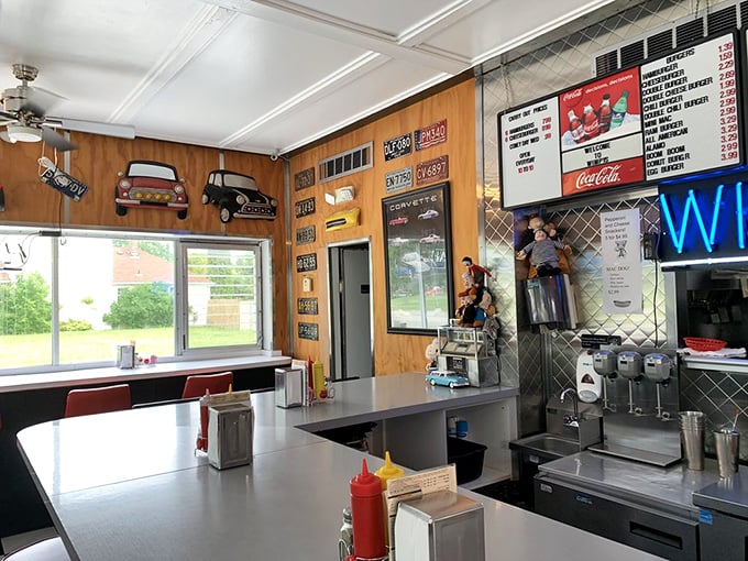 The counter area serves as command central, where friendly staff work their magic while regulars perch on red stools trading neighborhood news.