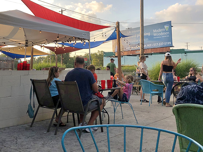 The outdoor patio offers a festive atmosphere with colorful shade sails and string lights &ndash; perfect for enjoying pizza under actual stars.