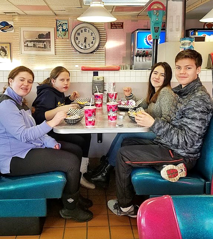 The comfortable booths invite families to linger, share stories, and create memories over comfort food classics.