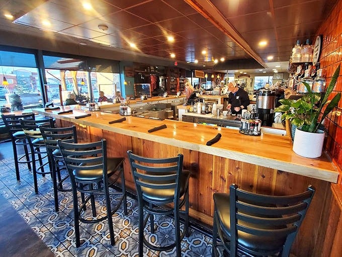 The counter offers front-row seats to culinary magic&mdash;where coffee flows freely and breakfast dreams come true.