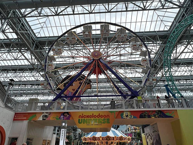 The Ferris wheel offers a moment of relative calm amid the cheerful chaos, perfect for catching your breath and planning your next adventure.