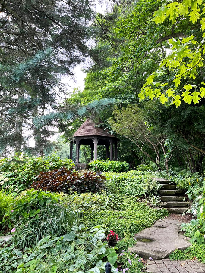 Stone steps meander through lush plantings that change with the seasons, offering year-round interest even in Michigan's notoriously fickle climate.
