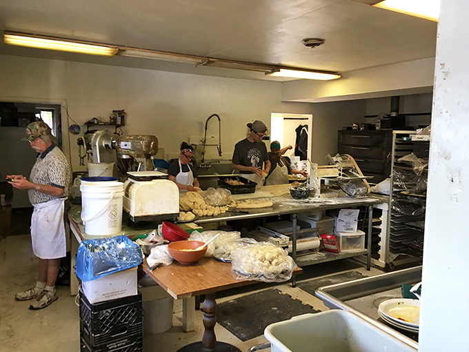 Behind the scenes, the kitchen team works their magic, turning out fresh baked goods and hot meals with the efficiency of a well-oiled machine.