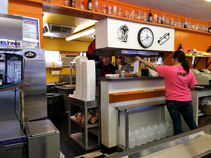 Behind the counter where root beer mugs line the shelves, waiting for their moment to shine filled with frothy goodness.