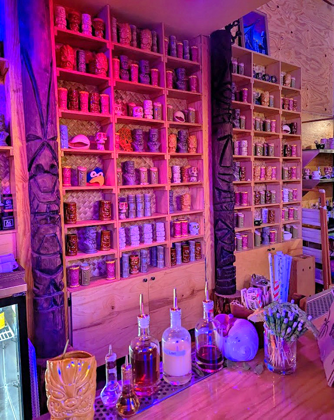 This wall of tiki mugs isn't just decoration &ndash; it's a museum of good times waiting to happen.