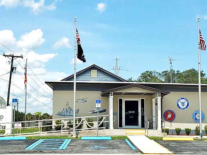 The Military Sea Services Museum honors those who served, with patriotic flags standing tall against Florida's brilliant blue skies.