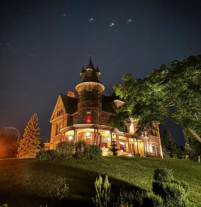 At night, Henderson Castle looks like it's auditioning for every gothic novel ever written.
