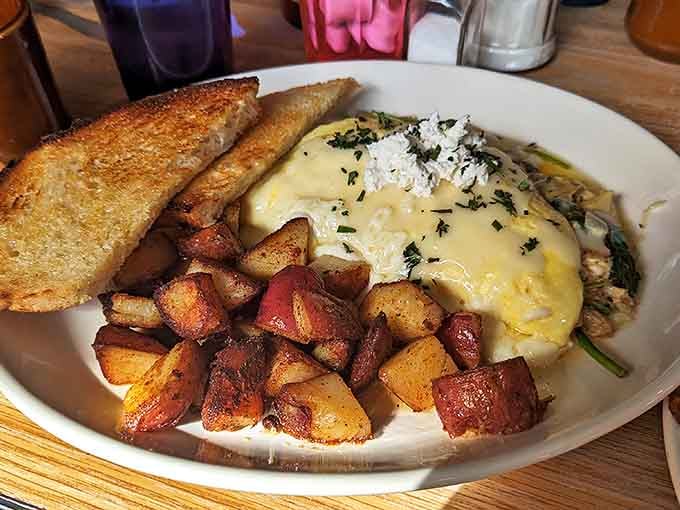 An omelet so perfectly executed it makes you wonder if the chef has an advanced degree in egg architecture.
