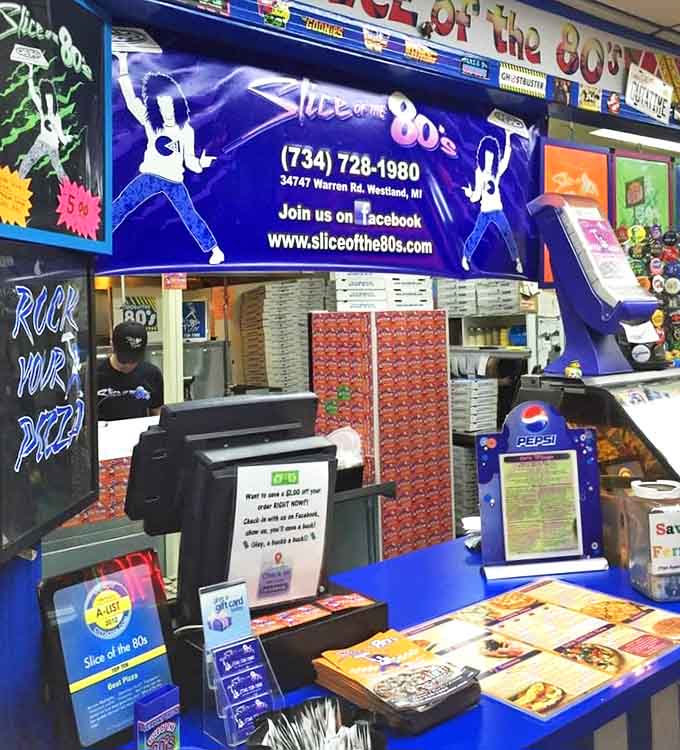 The order counter area pops with neon colors and '80s iconography &ndash; where friendly staff stand ready to help you navigate the radical menu options.