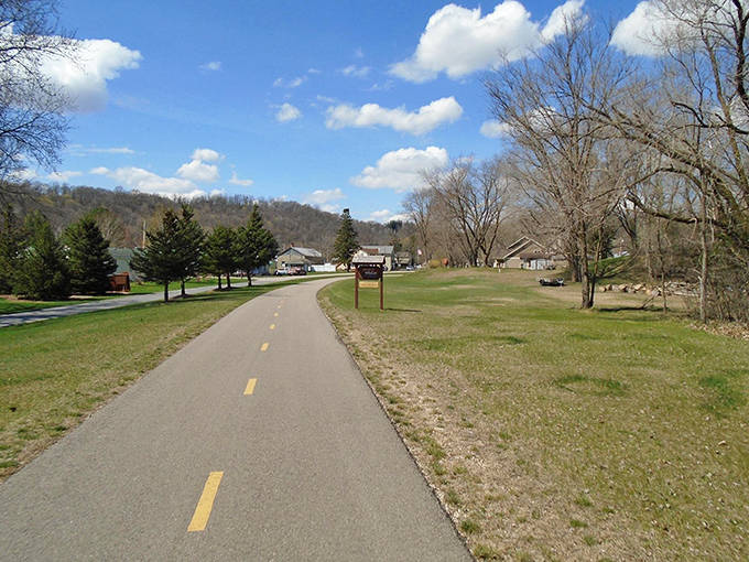 The Root River State Trail invites cyclists and walkers to experience 42 miles of scenic beauty, with Rushford serving as the perfect pit stop.