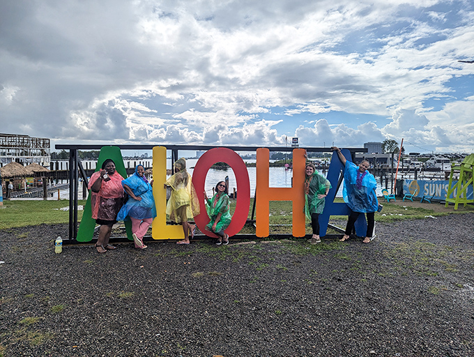 Sunset transforms the tiki boat into a silhouette of pure vacation goals, proving that magic hour is even more magical when you're floating.